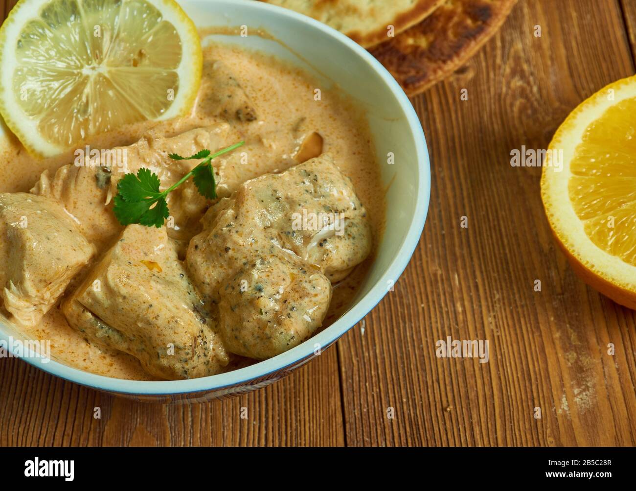 Nawabi Chicken,Chicken is cooked in an onion, cashewnut and curd gravy ...