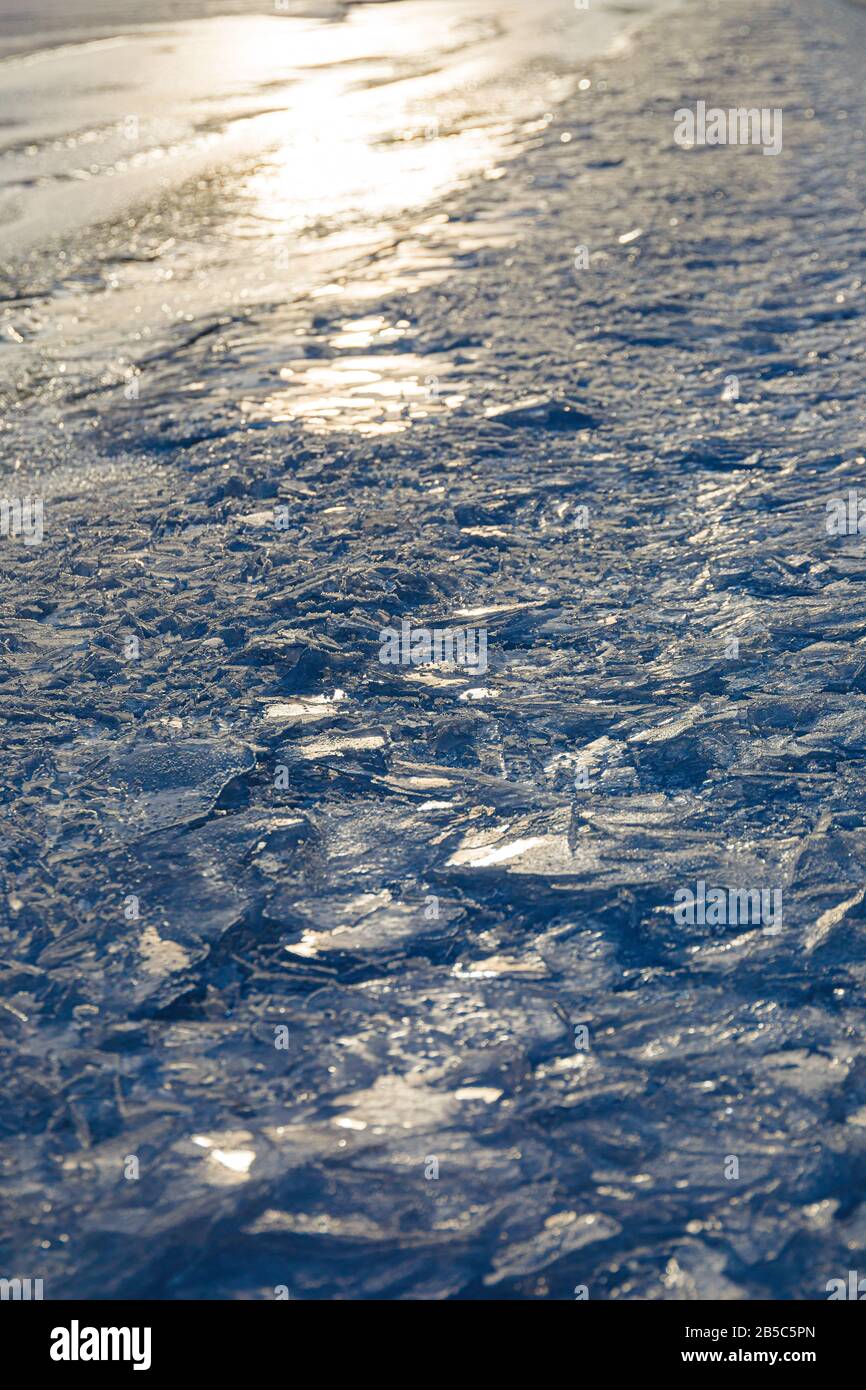 Texture of ice on the frozen lake. Blue color background Stock Photo ...