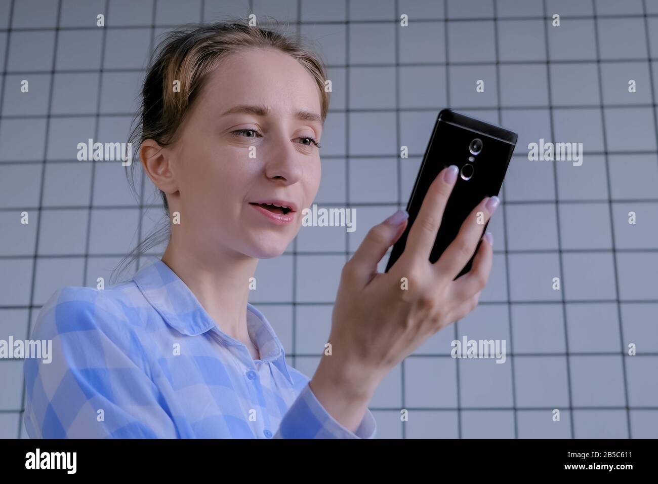 Woman entrepreneur having online video hi-res stock photography and ...