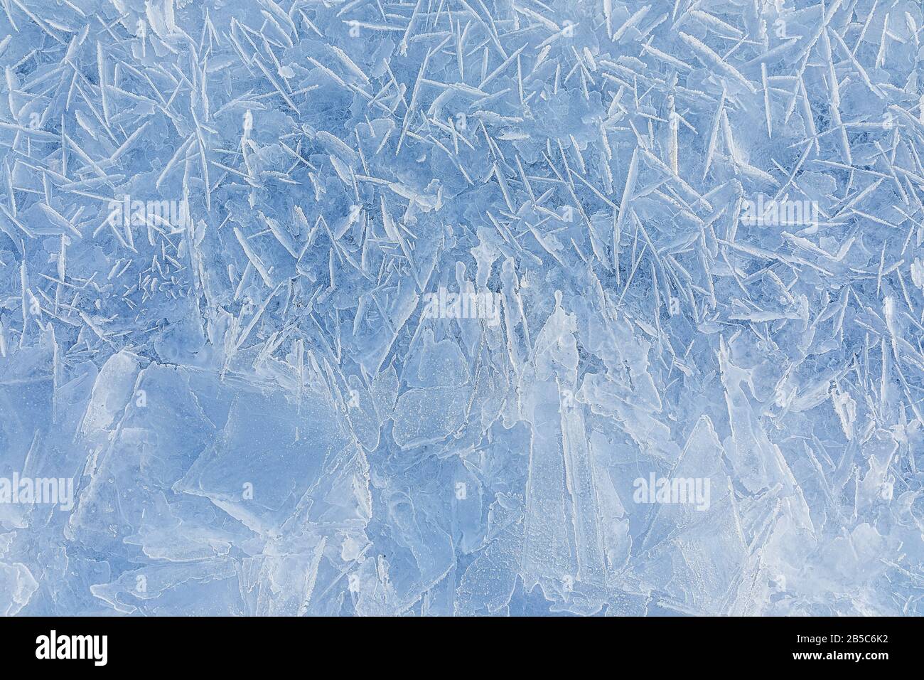 Texture of ice on the frozen lake. Blue color background Stock Photo ...