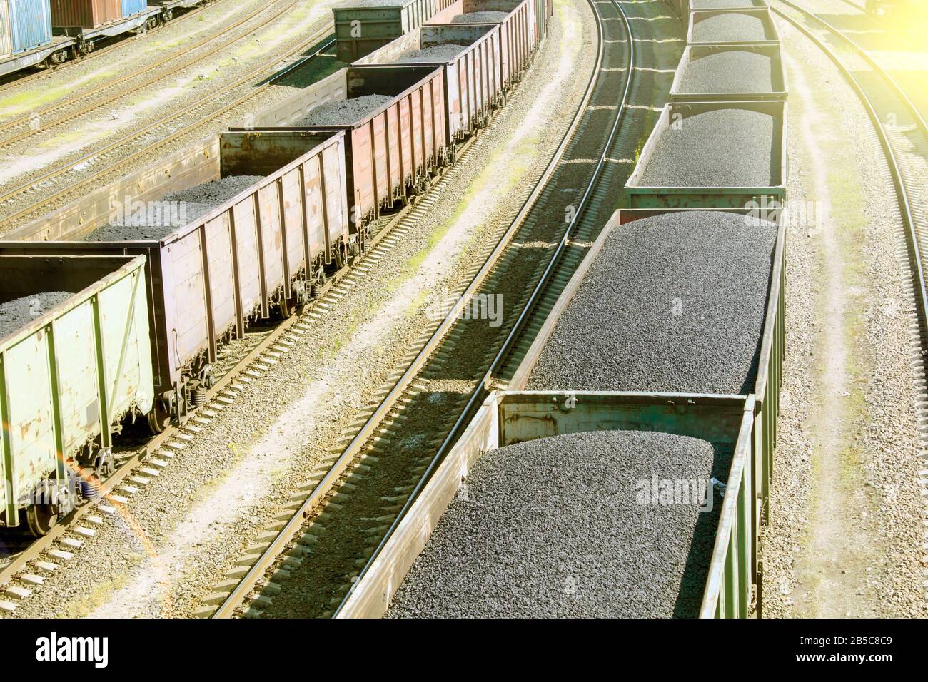 rail cars loaded with coal, a train transports coal Stock Photo - Alamy