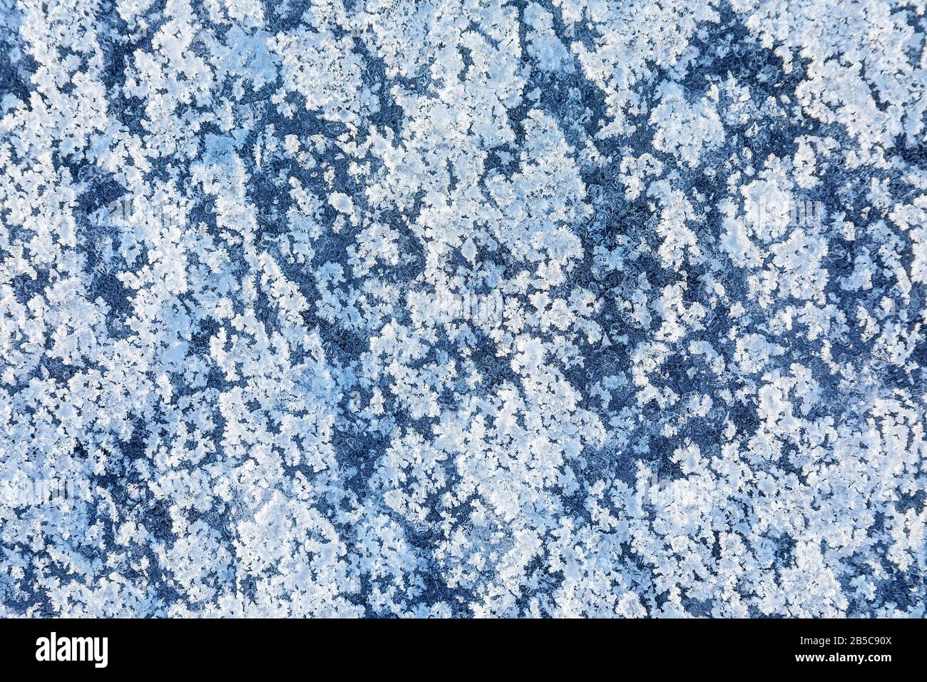 Texture of ice on the frozen lake. Blue color background Stock Photo ...