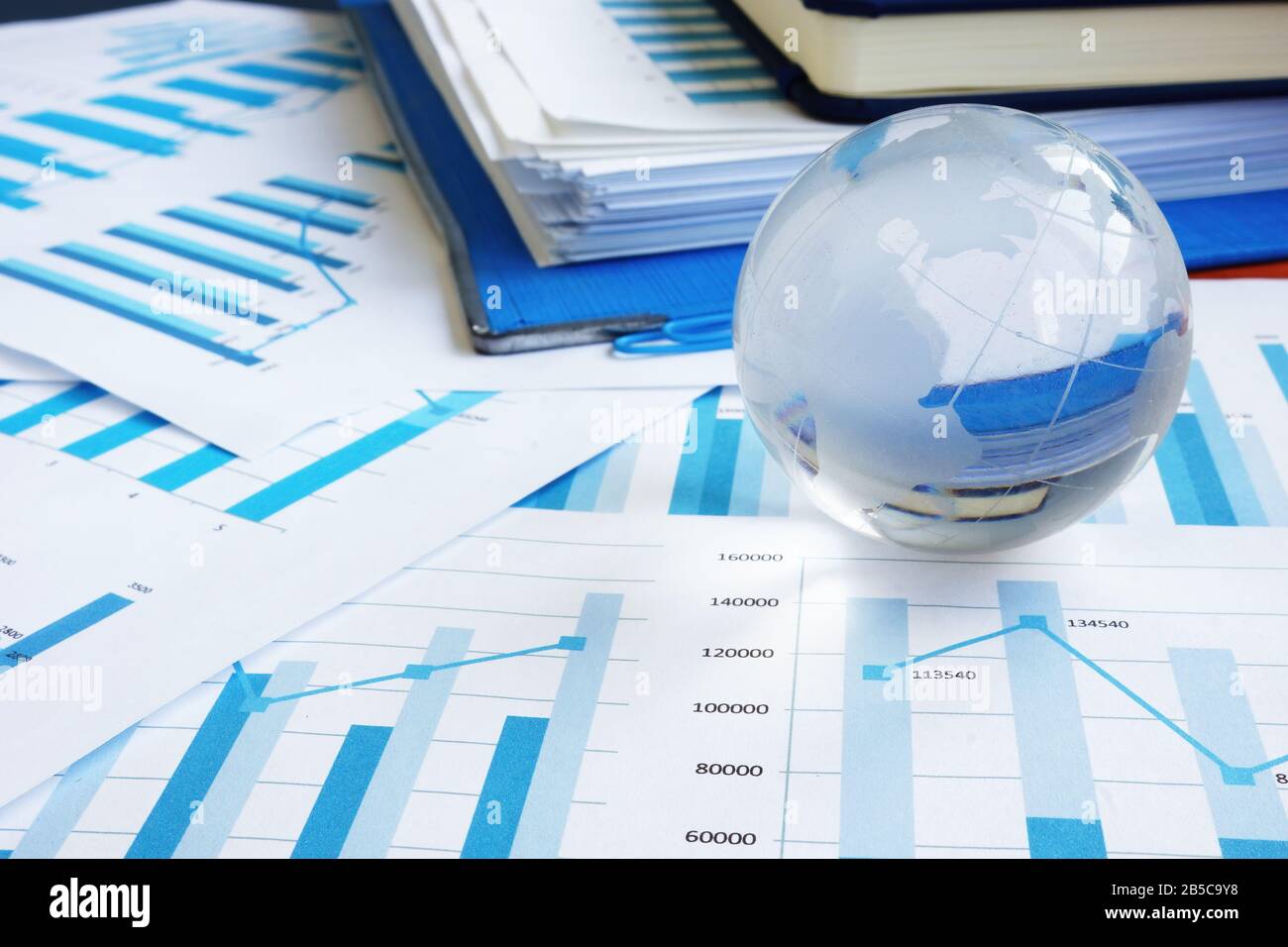 Globe and financial reports as symbol international global business ...