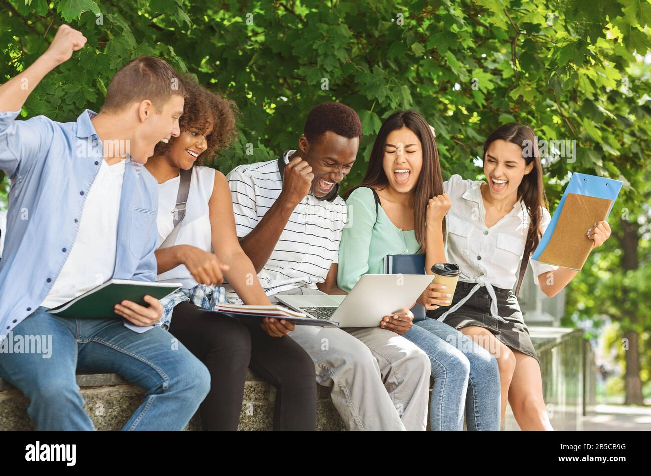 Students celebrating exam success hi-res stock photography and images ...