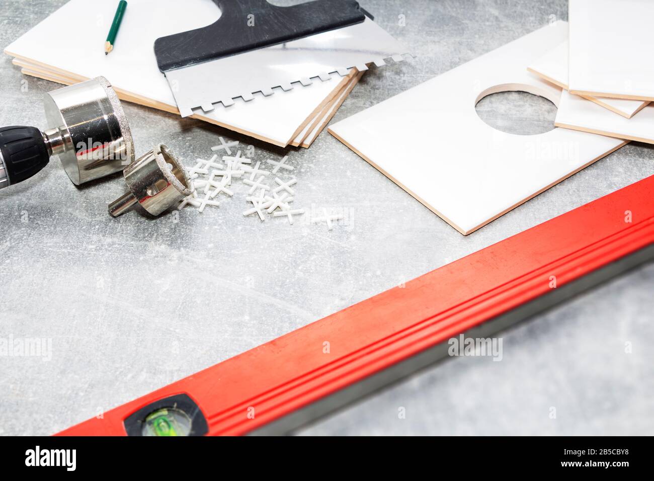 Installing ceramic floor tile hi-res stock photography and images - Alamy