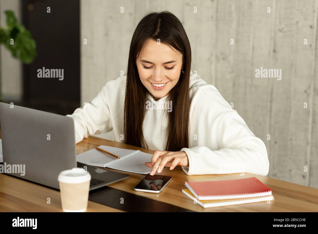 Freelance millennial girl works hi-res stock photography and images - Alamy