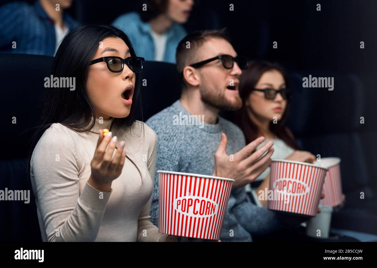 Cinema audience watching 3d movie hi-res stock photography and images ...