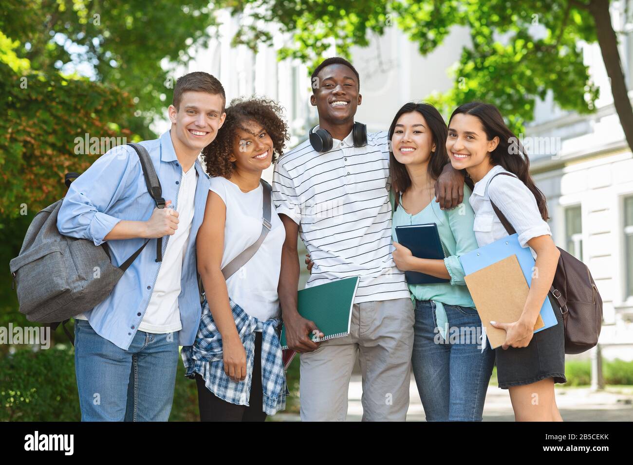 Group of international students posing in front of university Stock ...