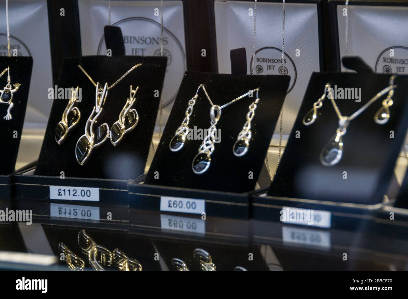 A window display of Whitby Black Jet handmade necklaces and matching ...