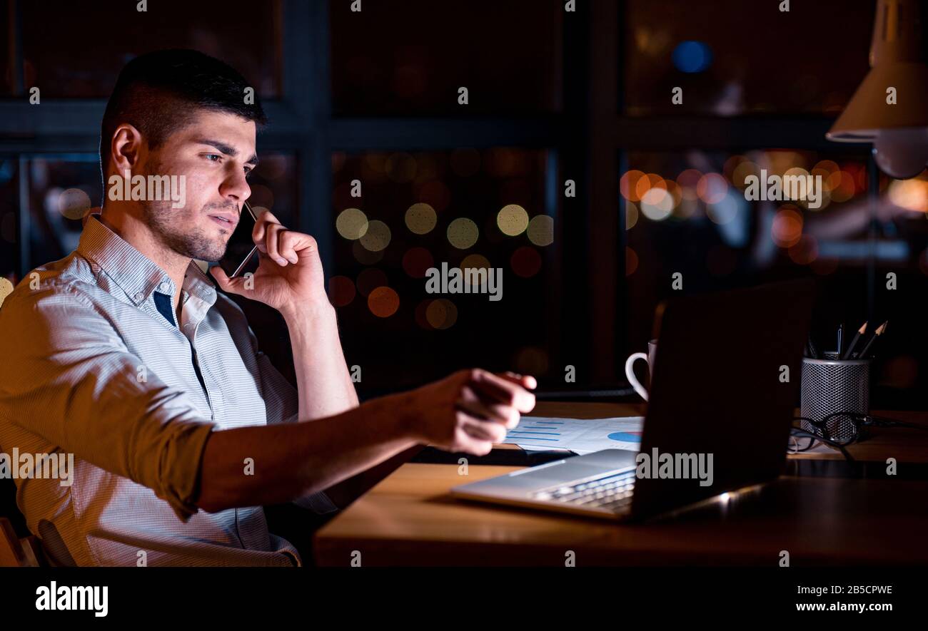 Entrepreneur Guy Talking On Phone Negotiating Business Deal In Office ...