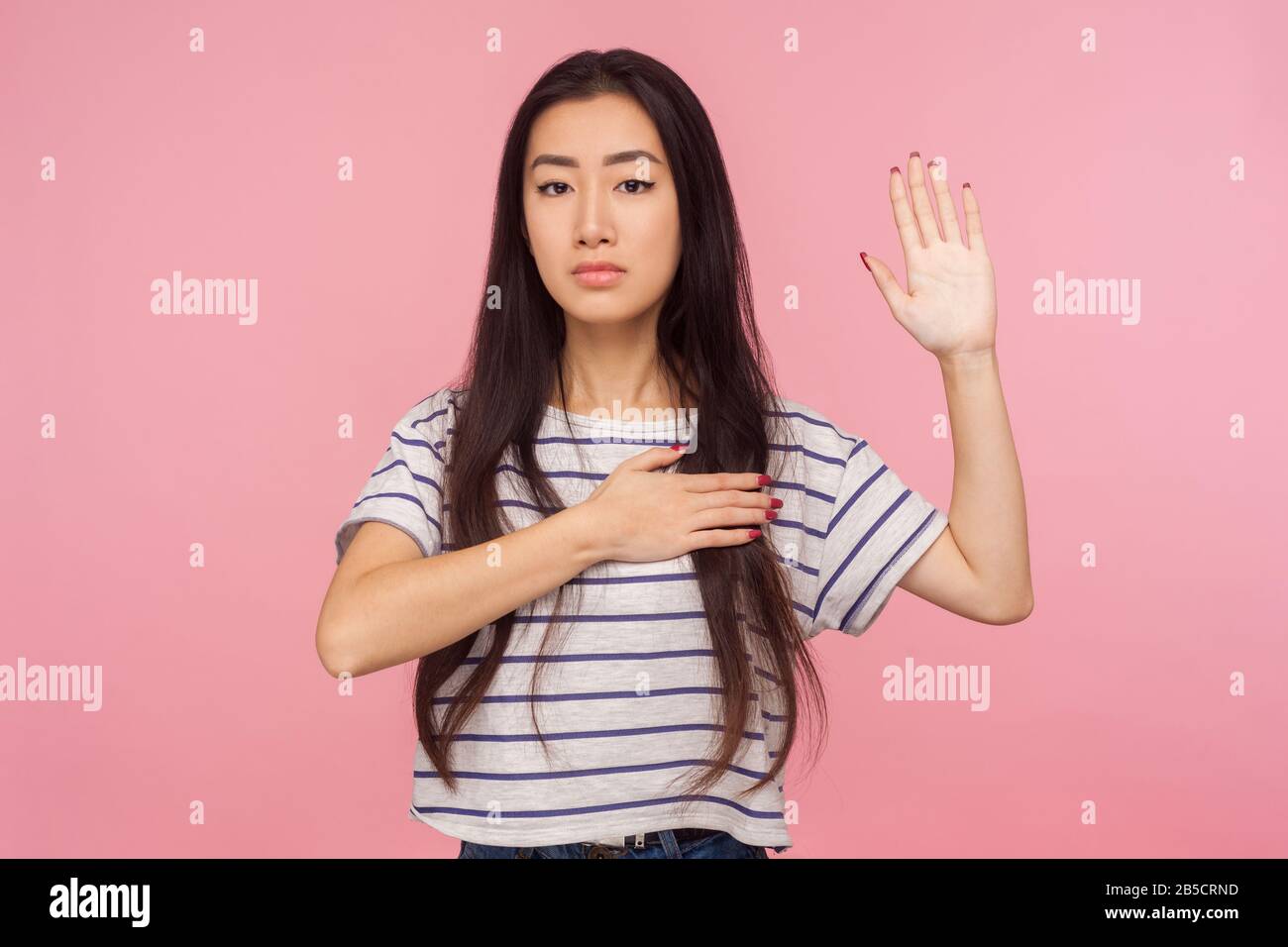 I give you promise! Portrait of responsible, honest girl with brunette ...