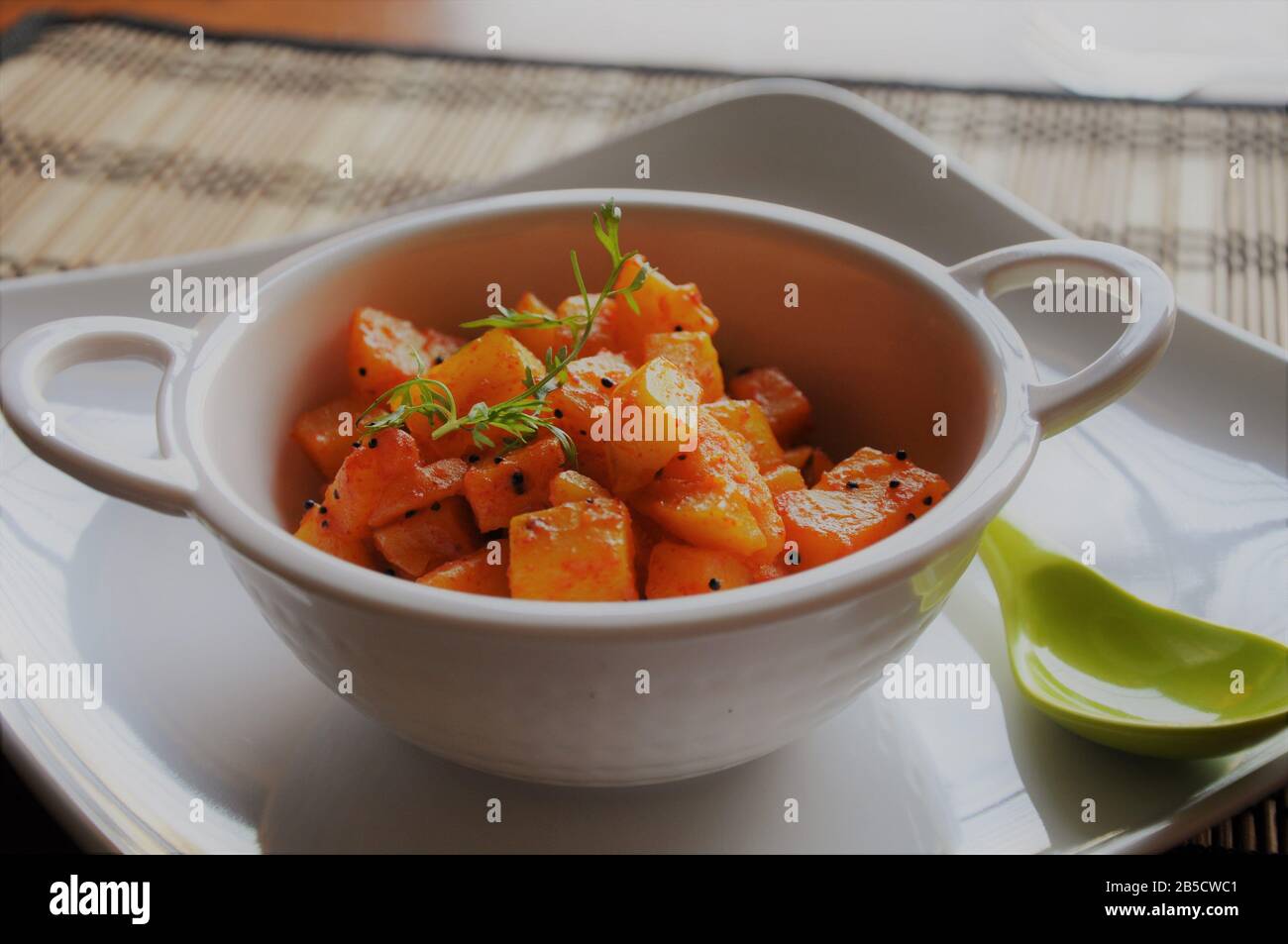 Indian style vegetarian food - potato subji in kadhai Stock Photo - Alamy