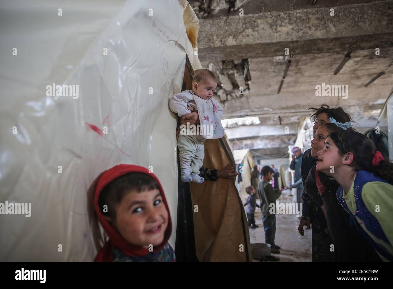 Children playing football in syria hi-res stock photography and images ...
