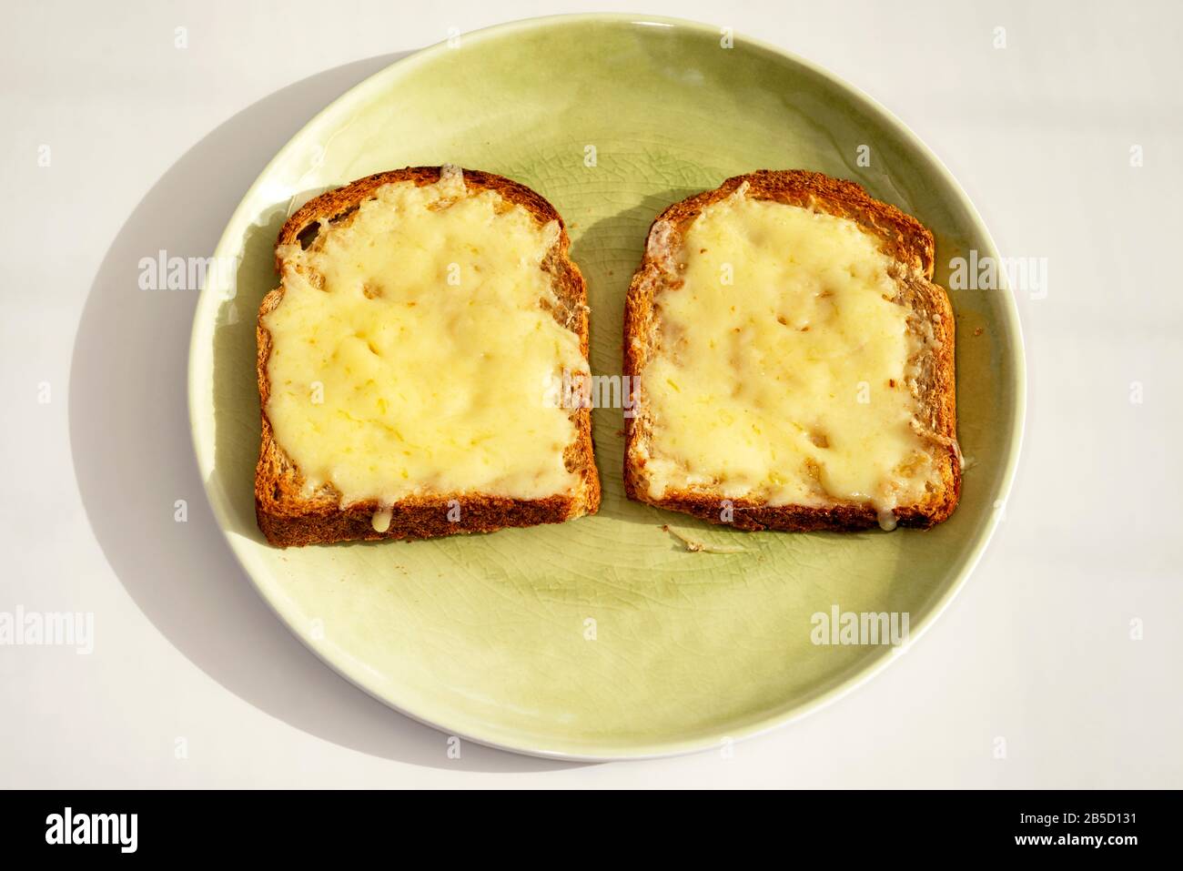 toasted cheddar cheese on wholemeal toast Stock Photo - Alamy