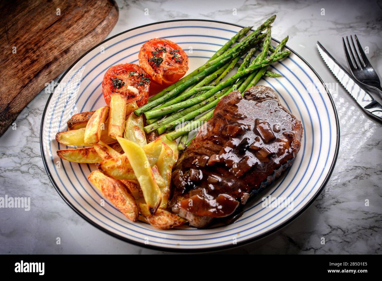 Steak,chips and gravy Stock Photo - Alamy