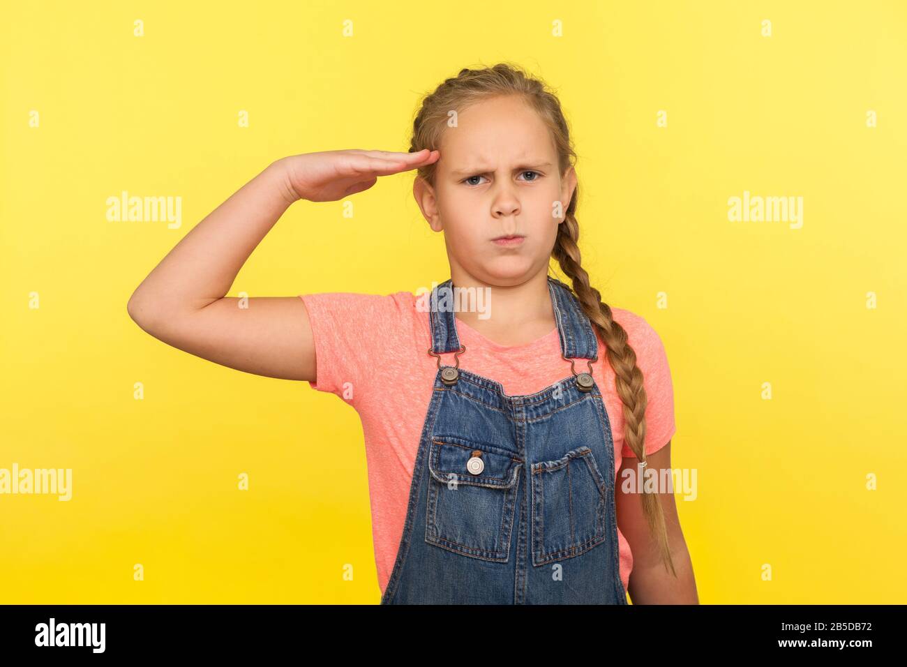 Yes sir! Portrait of responsible obedient little girl with braid in ...