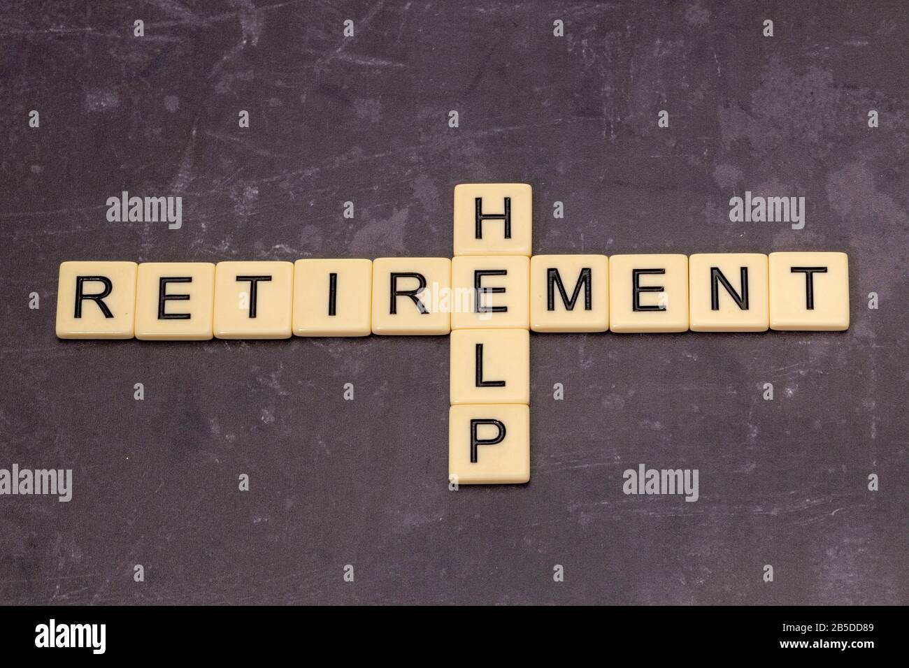 Game letters spelling out the words, Retirement Help Stock Photo - Alamy