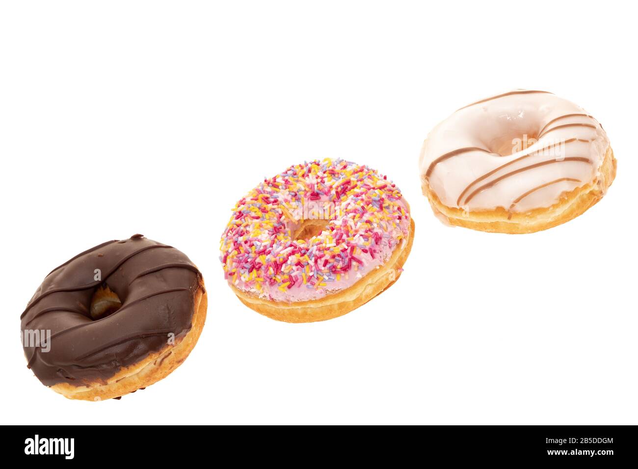 Three ring donuts - white background Stock Photo - Alamy