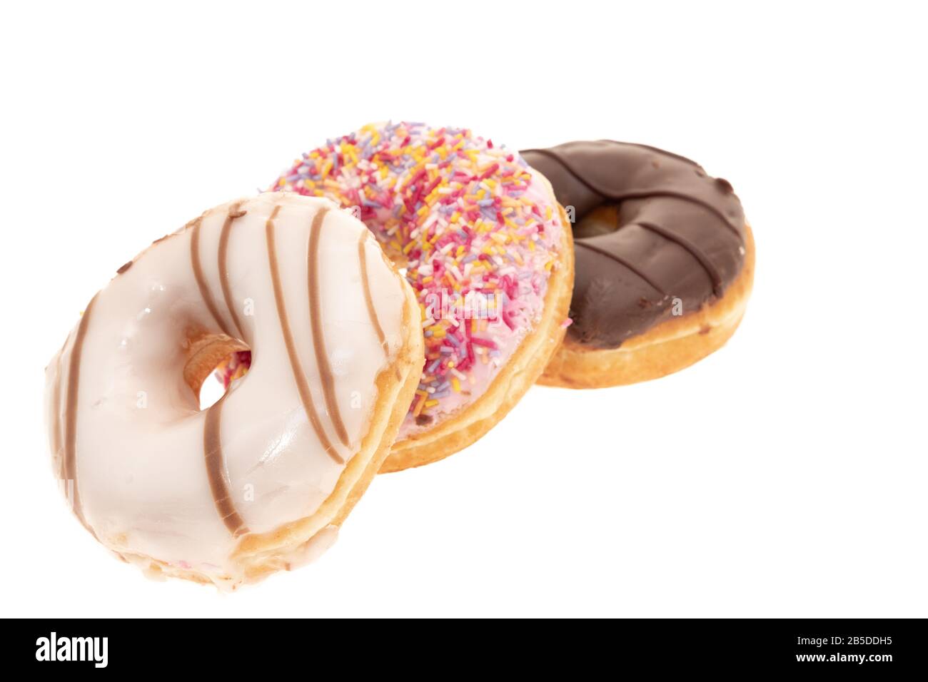 Three ring donuts - white background Stock Photo - Alamy