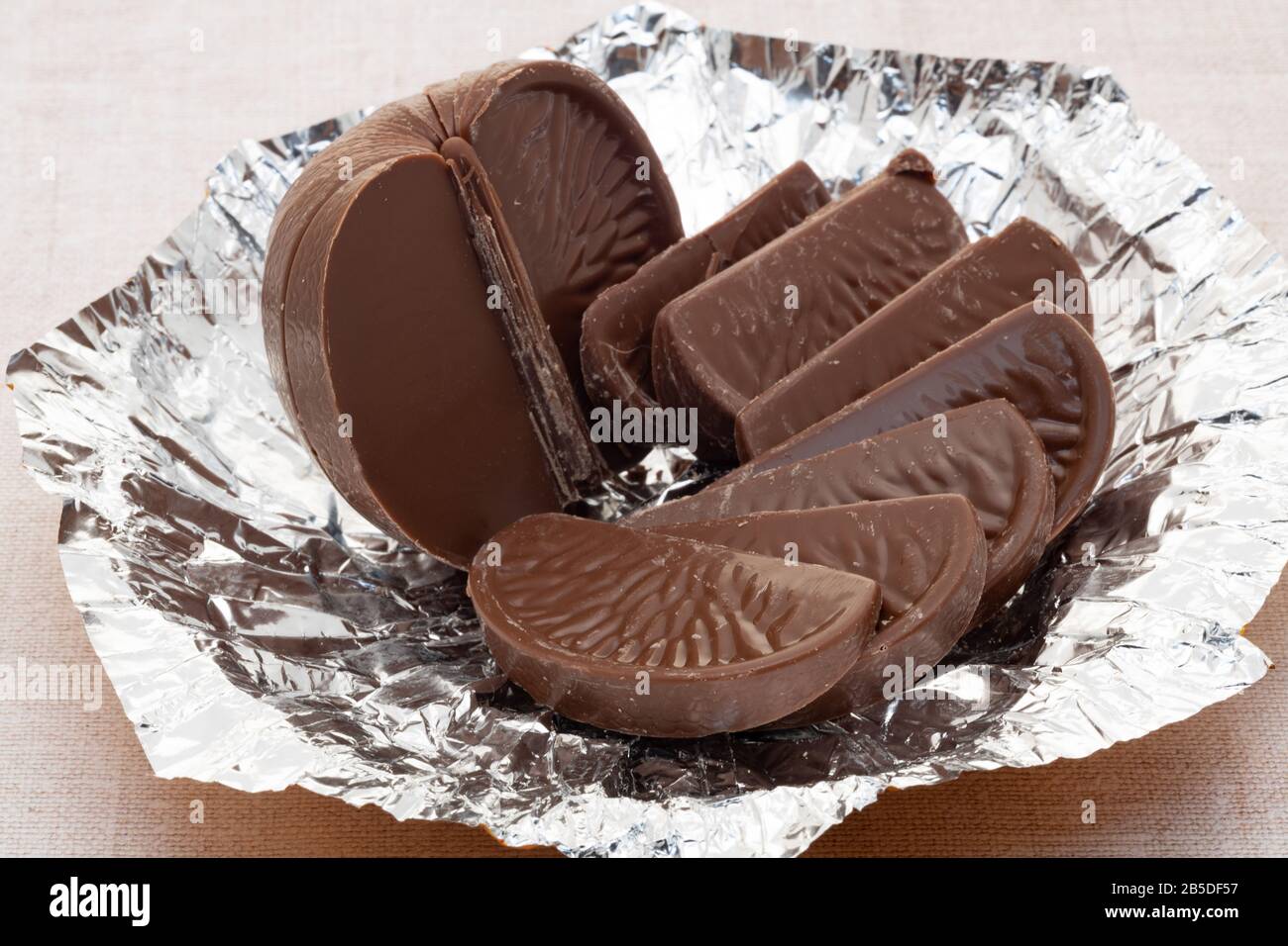 An unwrapped chocolate orange Stock Photo - Alamy