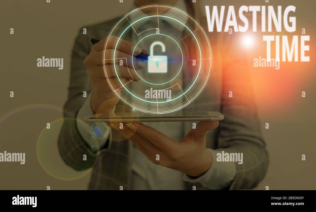 Writing note showing Wasting Time. Business concept for act of spending ...