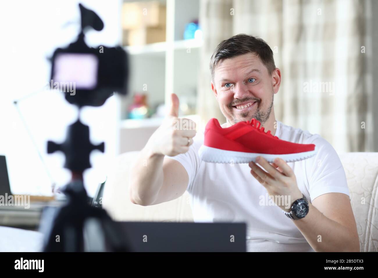 Smiling vlogger showing up hi-res stock photography and images - Alamy