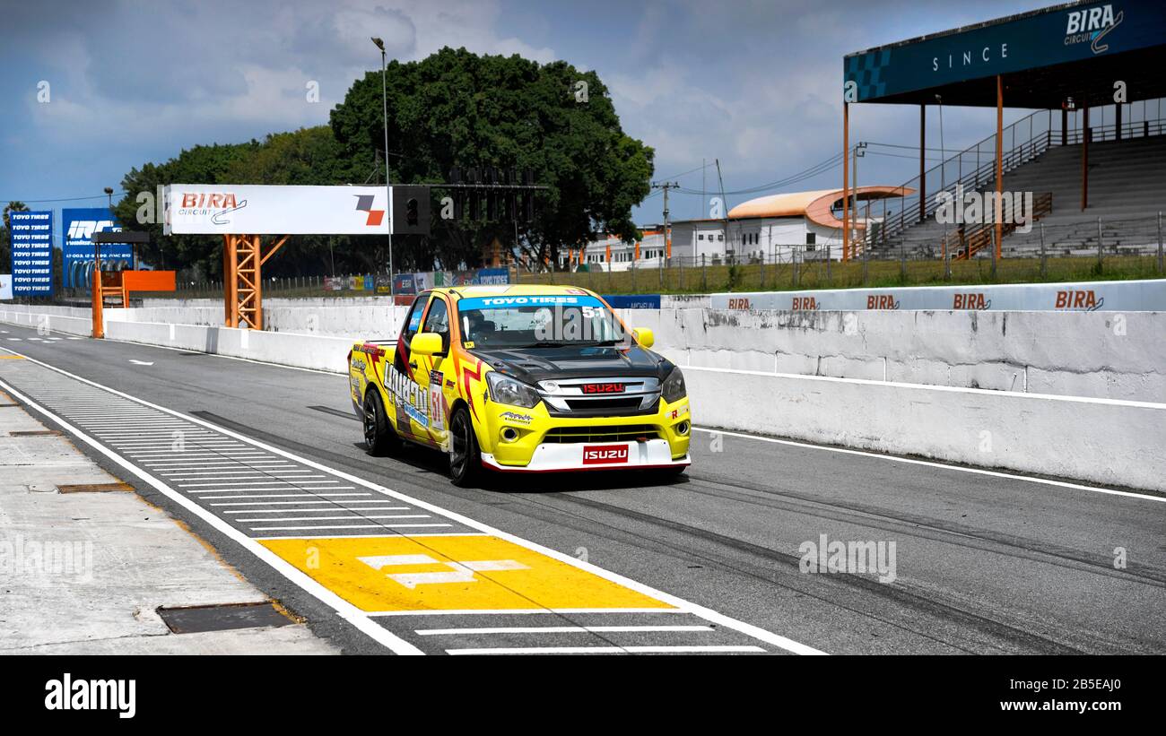 Racing pickup truck on the circuit approach lane. Bira Race circuit ...
