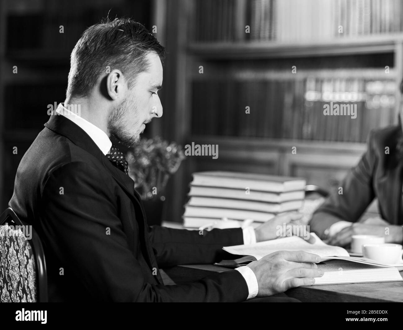 Science and studying concept. Man in classic suit or professor with ...