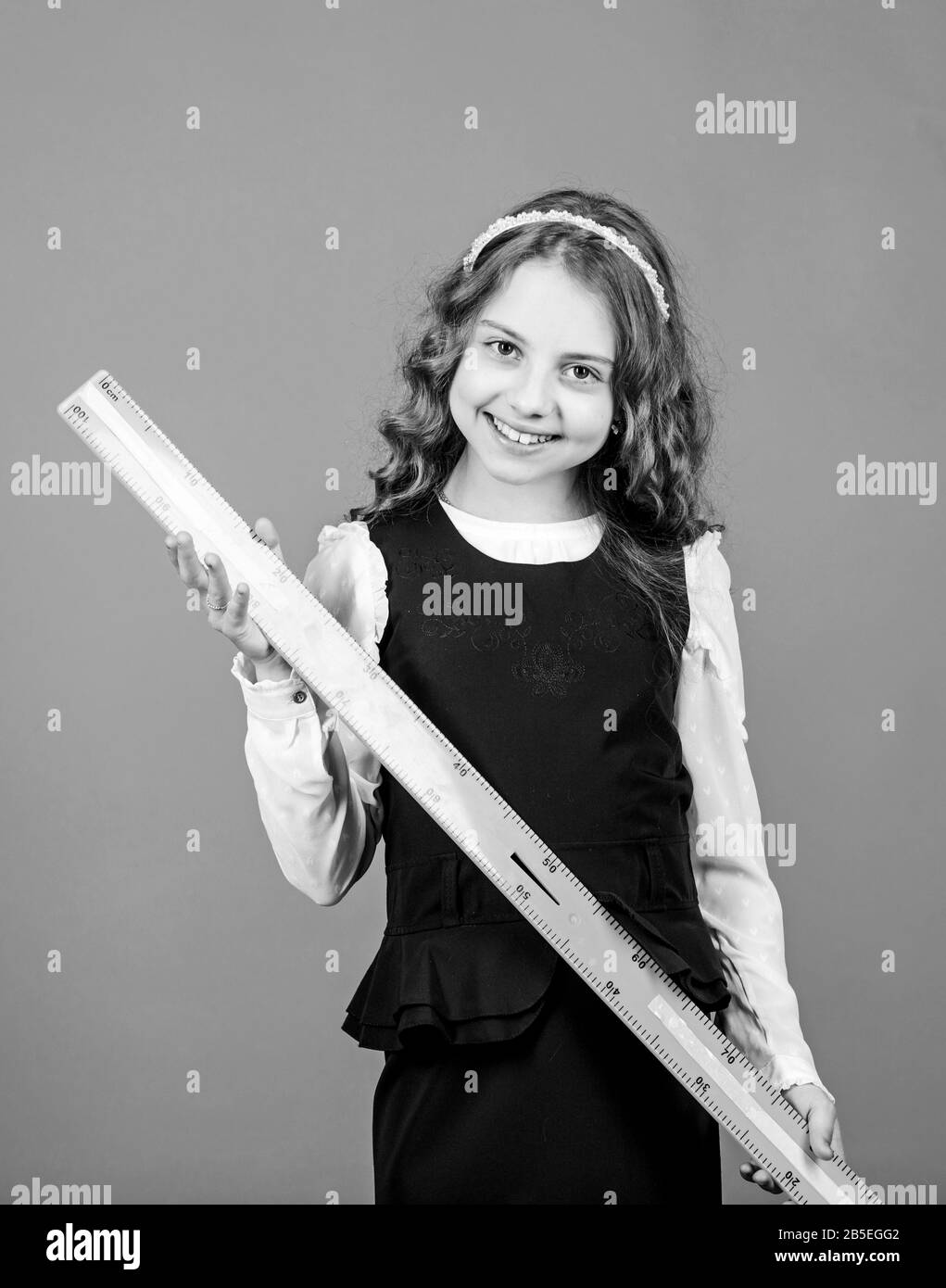 School student study geometry. Kid school uniform hold ruler. Pupil ...