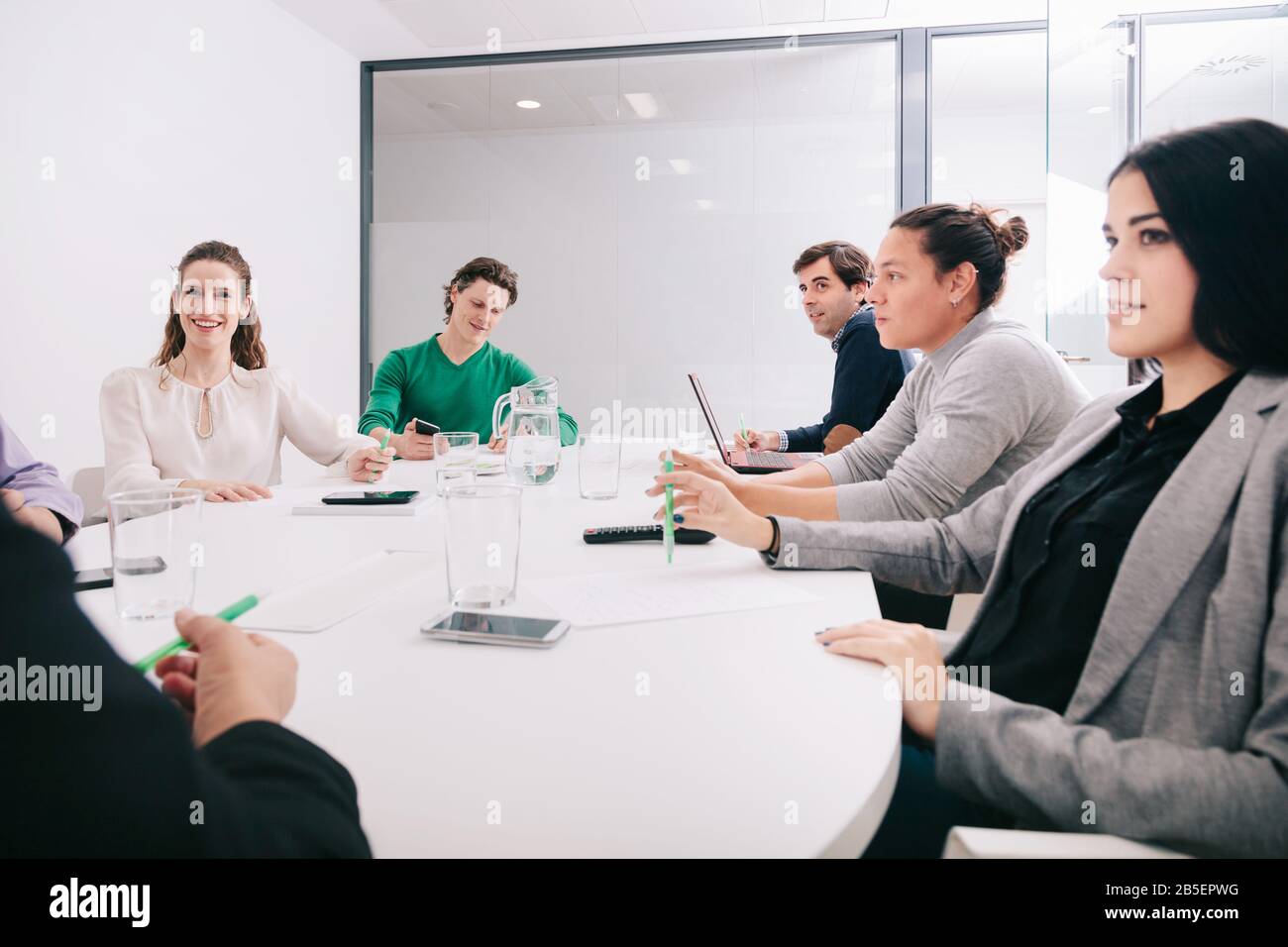 Office Workers Around Table High Resolution Stock Photography and ...