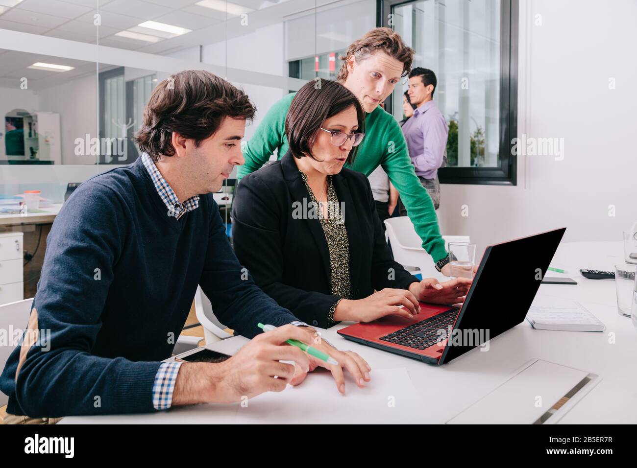 Office Workers Around Table High Resolution Stock Photography and ...