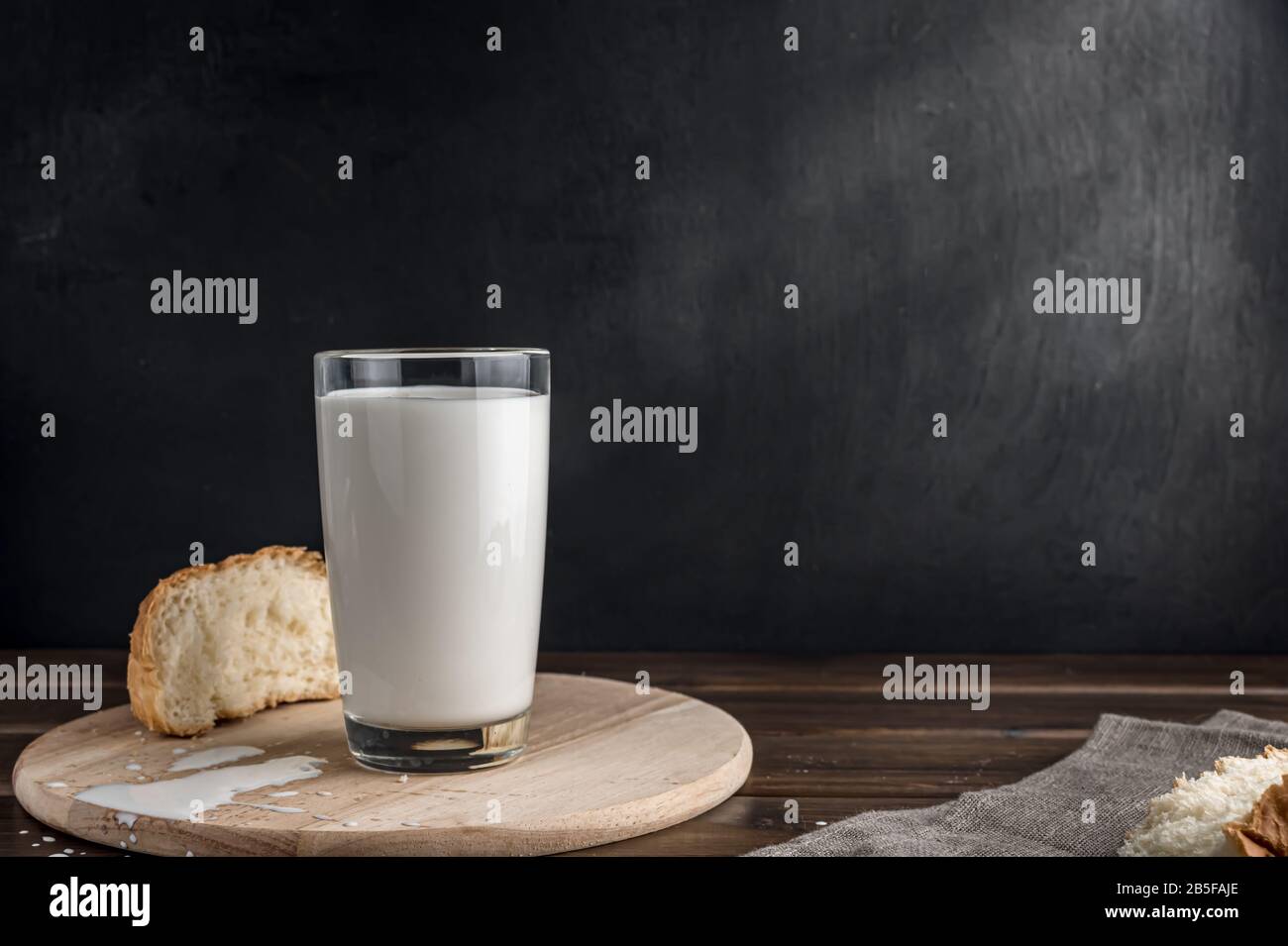 dairy products milk on a black background with copy space. concept raw ...