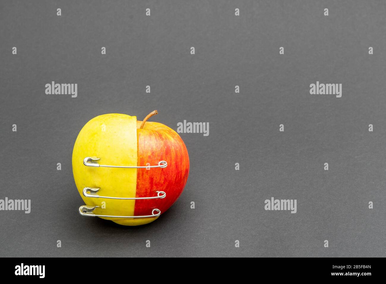 Two halves held together hi-res stock photography and images - Alamy