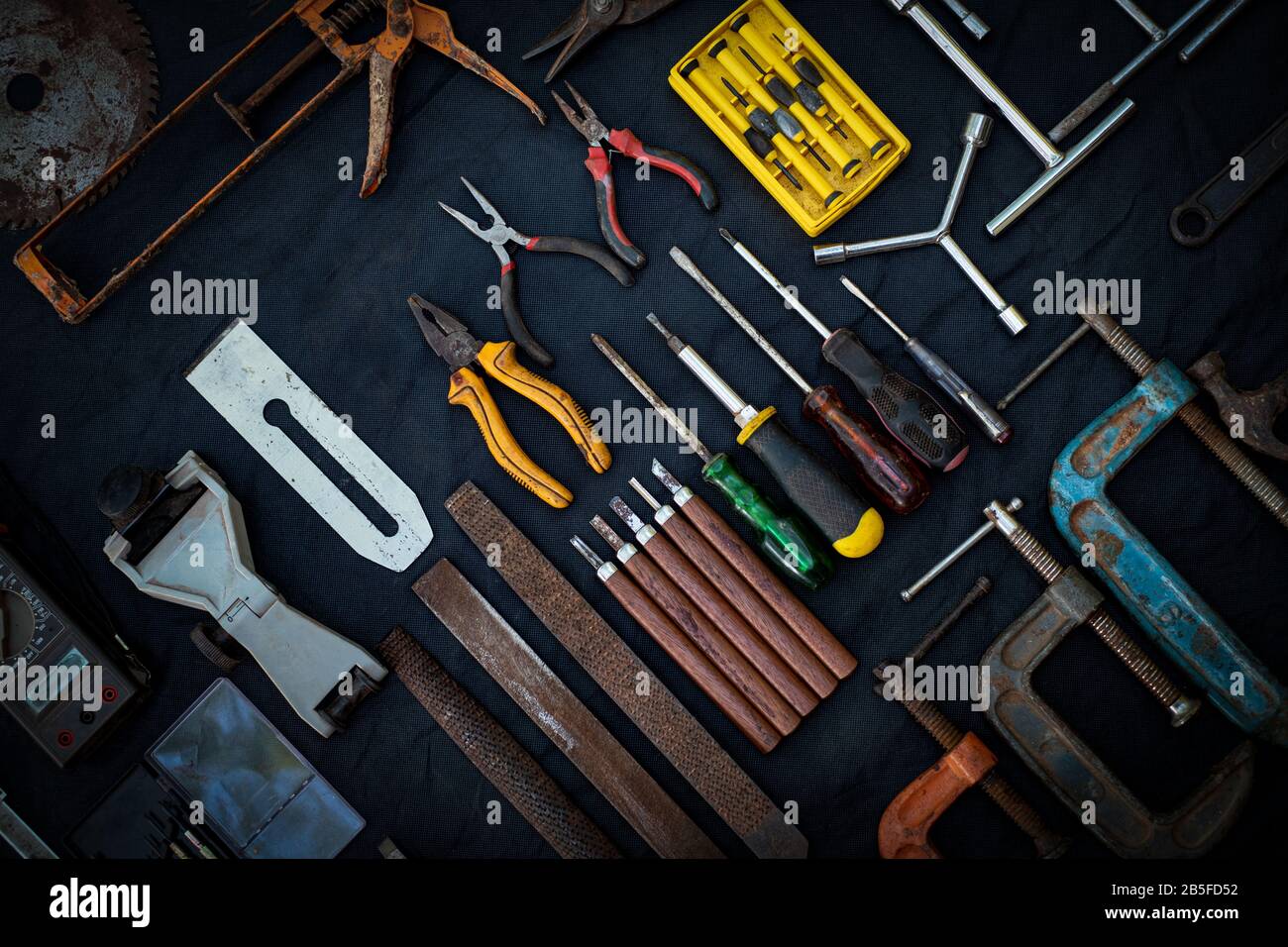 Photo top view a huge set collection of working hand and power tools ...