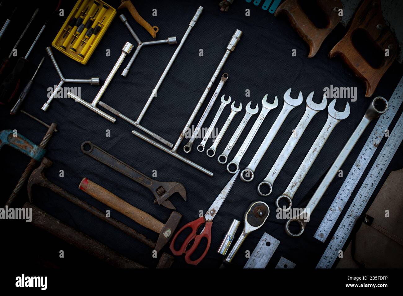 Photo top view a huge set collection of working hand and power tools ...