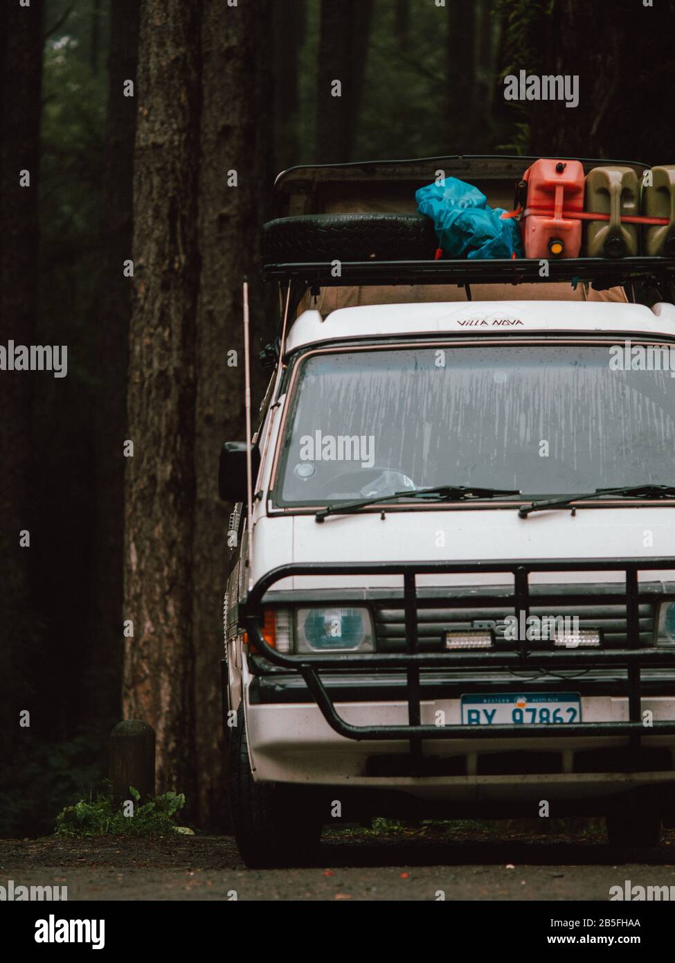 A traveller's caravan/camper van in a forest in Australia Stock Photo ...