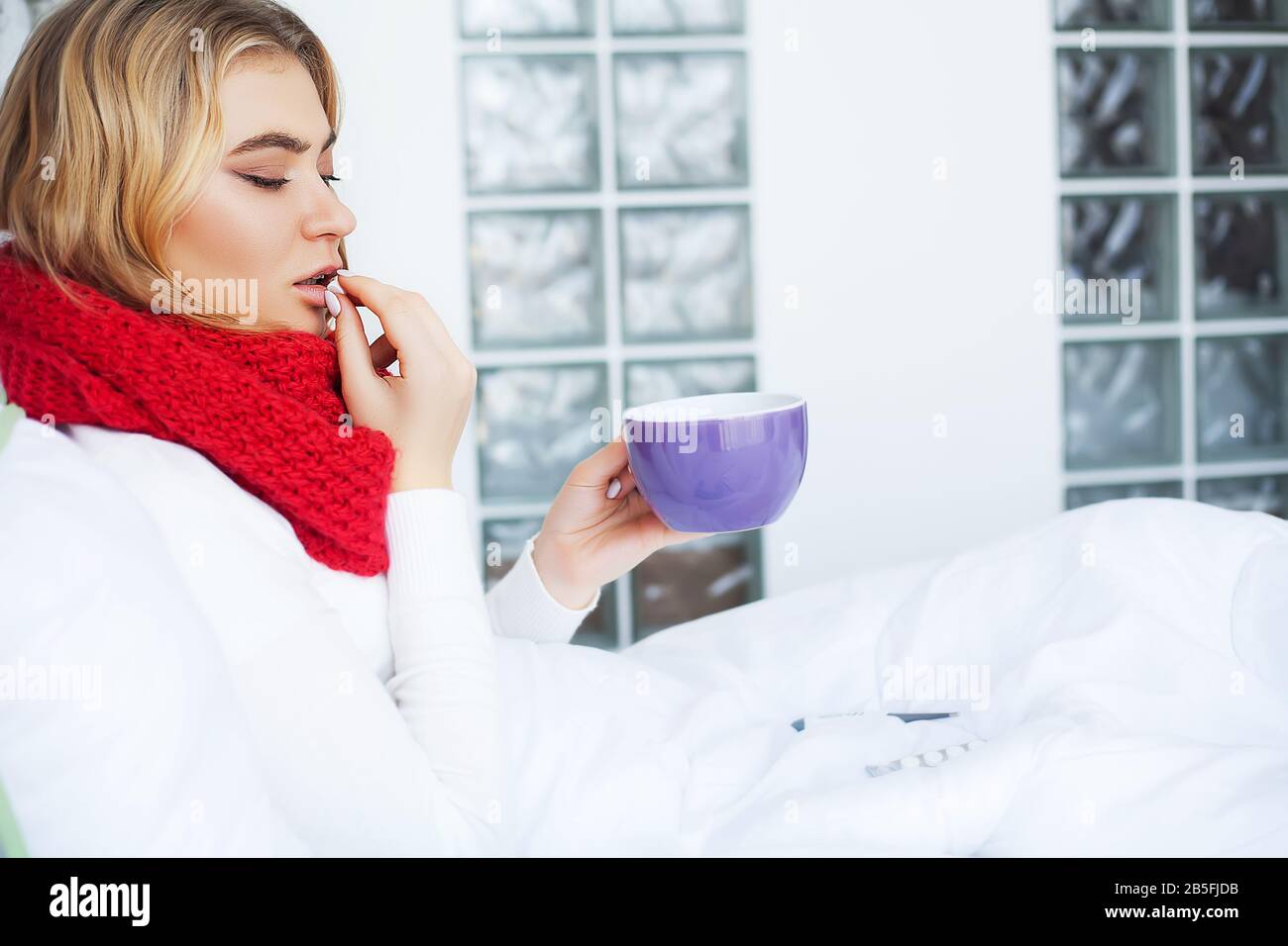Sick woman with virus is treated at home Stock Photo - Alamy