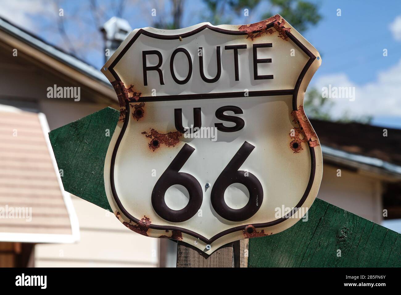 Metal plate along Route 66 .Route 66 (officially US Route 66) is an old ...