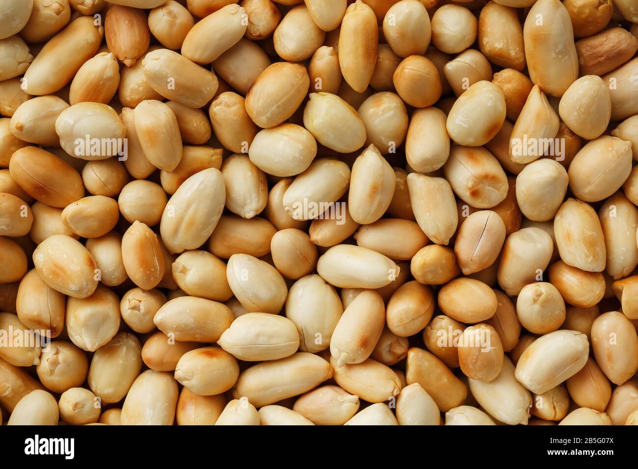 Peanut texture. Food background of peanuts bean. Golden, roasted ...