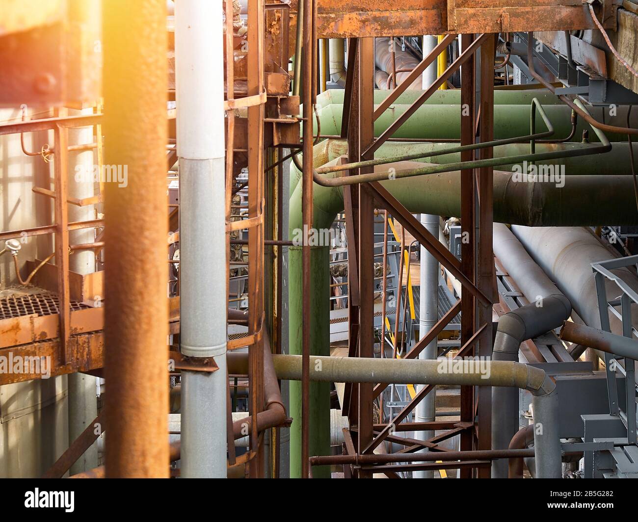 Tangle of pipes. Concept of complexity of petrochemical industry ...
