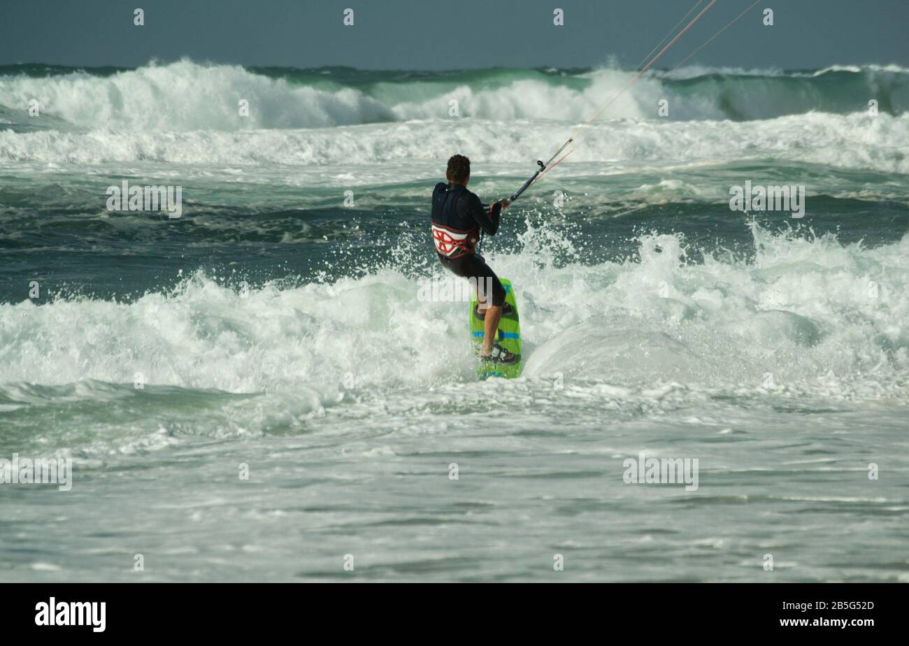 Kitesurfer riding the waves hi-res stock photography and images - Alamy