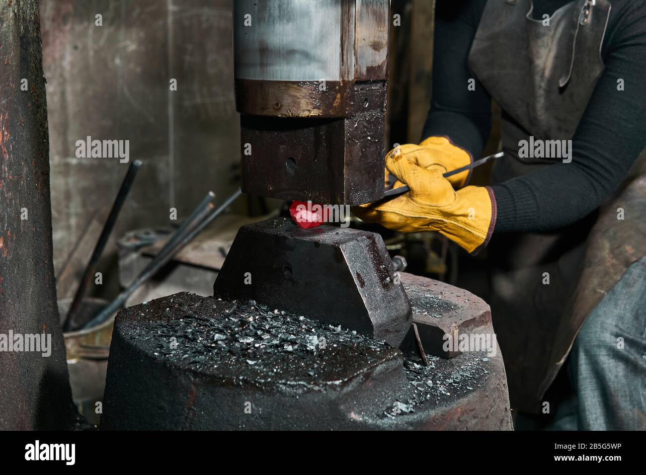 Woman blacksmith working in forge hi-res stock photography and images ...