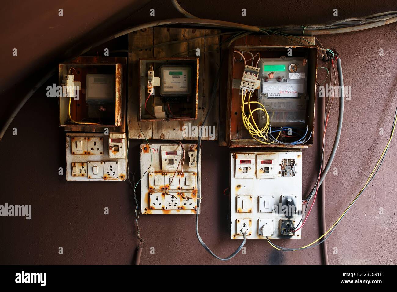 Old broken switchboard in interior of destroyed manufacturing plant ...