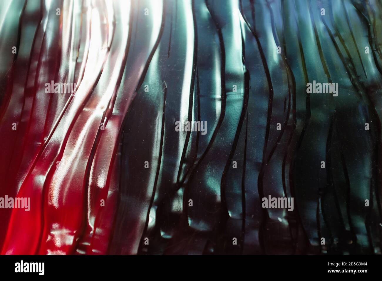 Red ruby glass Textured background, with a green tint Stock Photo - Alamy