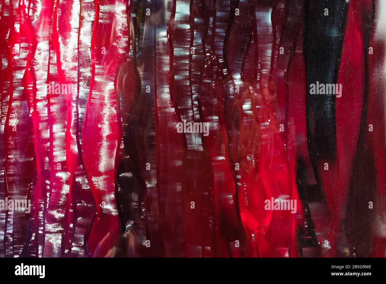 Red ruby glass Textured background, with a green tint Stock Photo - Alamy
