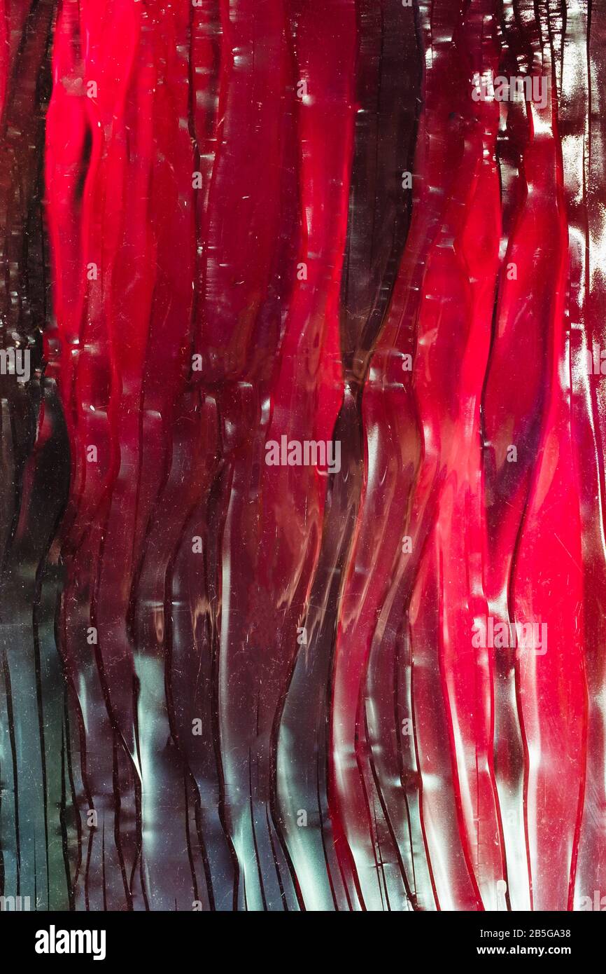 Red ruby glass Textured background, with a green tint Stock Photo - Alamy