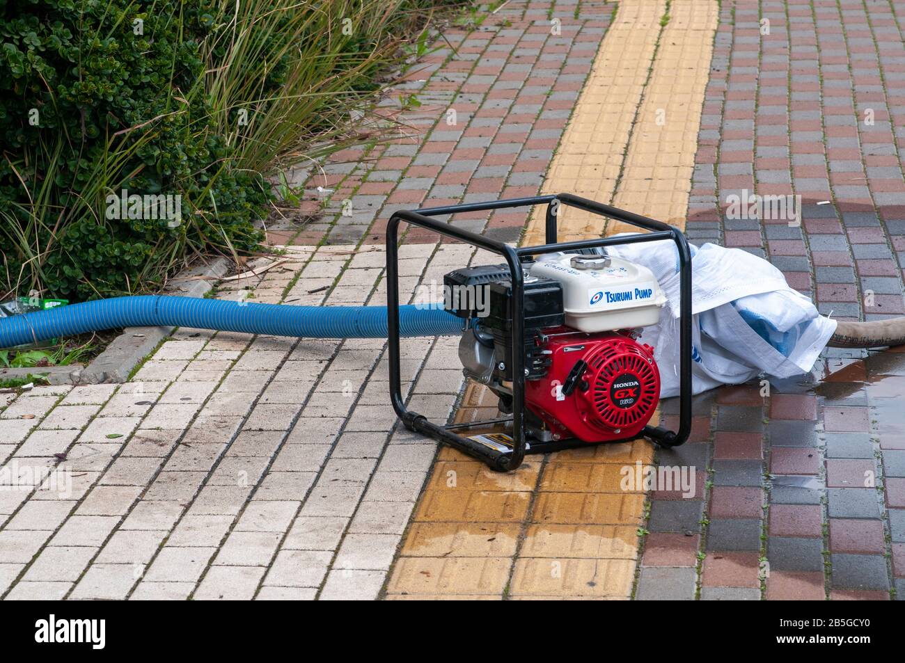 Gasoline operated Centrifugal engine-driven pump is pumping wastewater ...