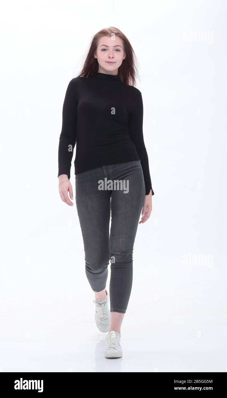 full length . modern young woman stepping forward Stock Photo - Alamy
