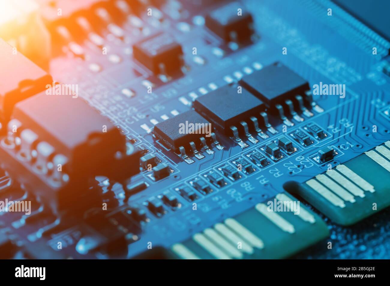 Electronic circuit board close up. Processor, chips and capacitors ...