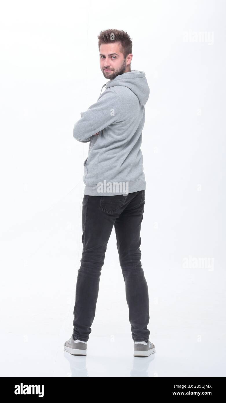 stylish young man looking forward. isolated on white Stock Photo - Alamy